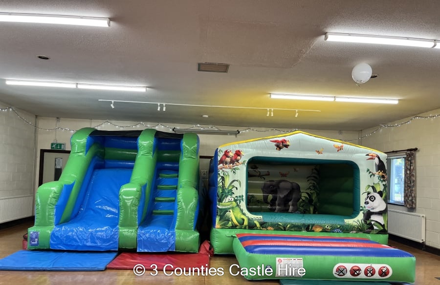 Jungle platform slide and low height jungle castle - Bouncy Castles ...